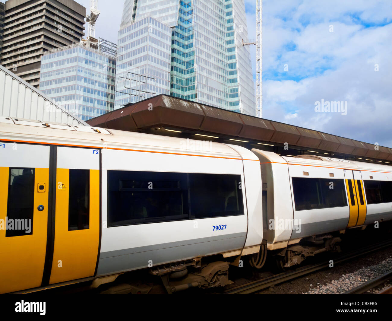 Suburban commuter train at London Bridge Station with The Shard ...