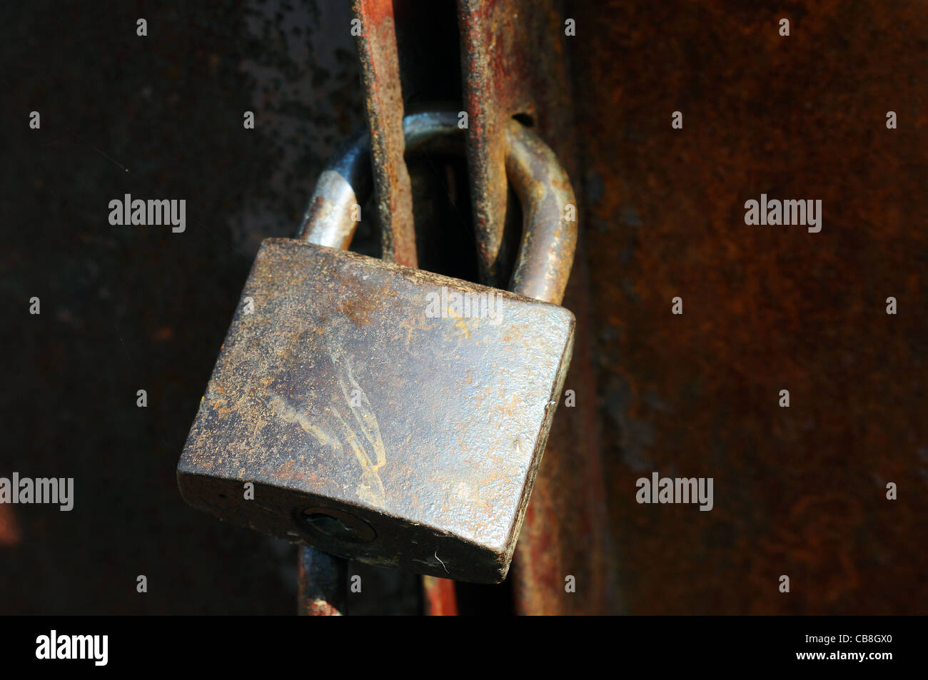 Closeup view of an old lock on an iron door Stock Photo - Alamy