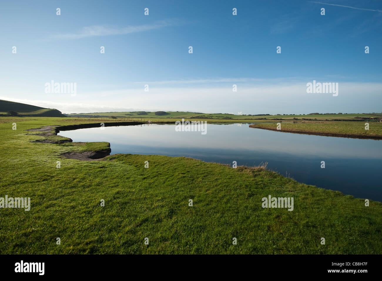 The River Cuckmere in floodplains close to the sea at Cuckmere Haven ...