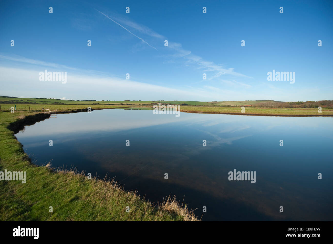 The River Cuckmere in floodplains close to the sea at Cuckmere Haven ...