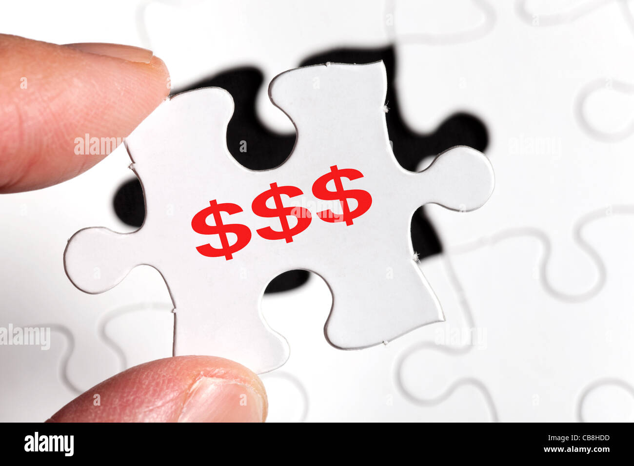 Puzzle and Dollar sign, business concept of Solution Stock Photo - Alamy
