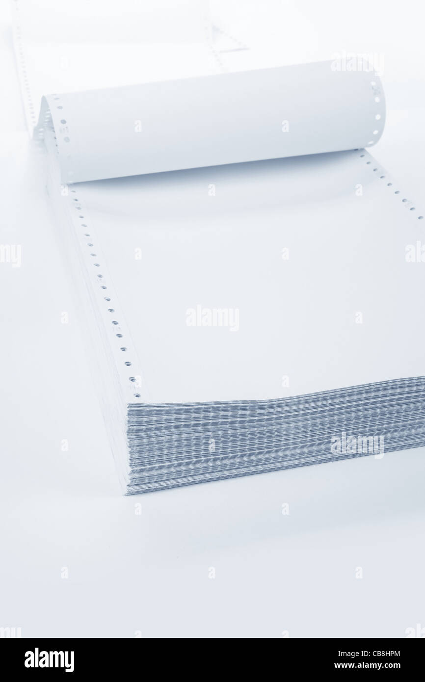 Perforated Computer Paper for background Stock Photo - Alamy