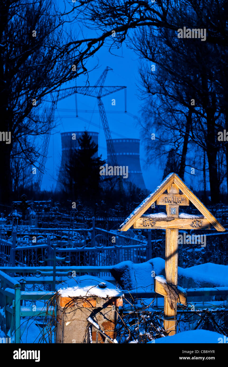 graveyard with nuclear power plant in background Stock Photo - Alamy