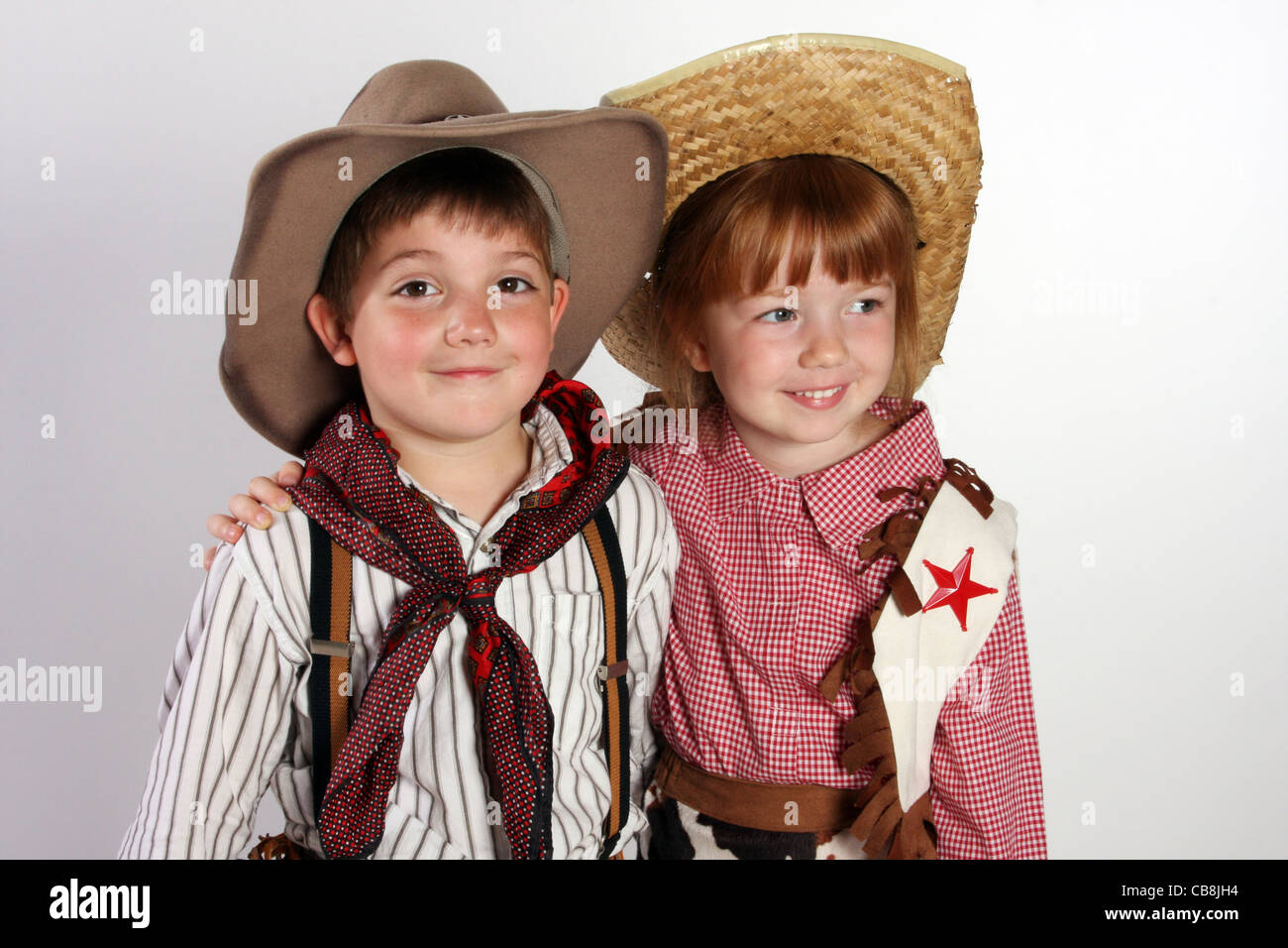 Cowboy and cowgirl children Stock Photo - Alamy