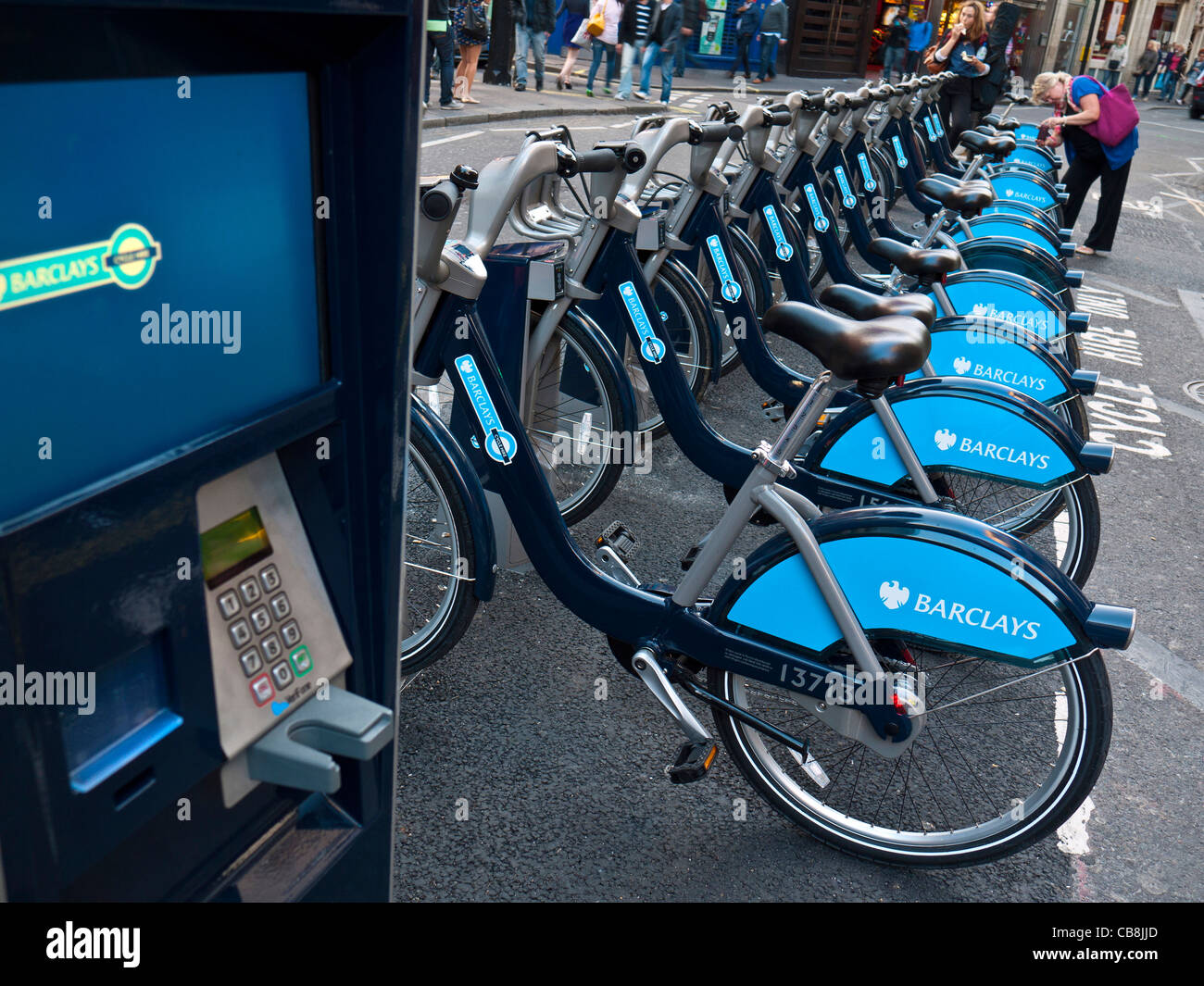 TFL London hire bikes in Soho with payment kiosk in foreground London ...