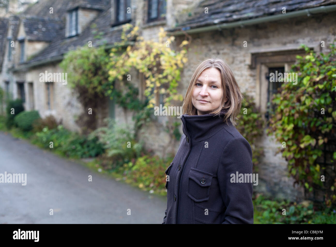 Young woman in rural setting Stock Photo - Alamy