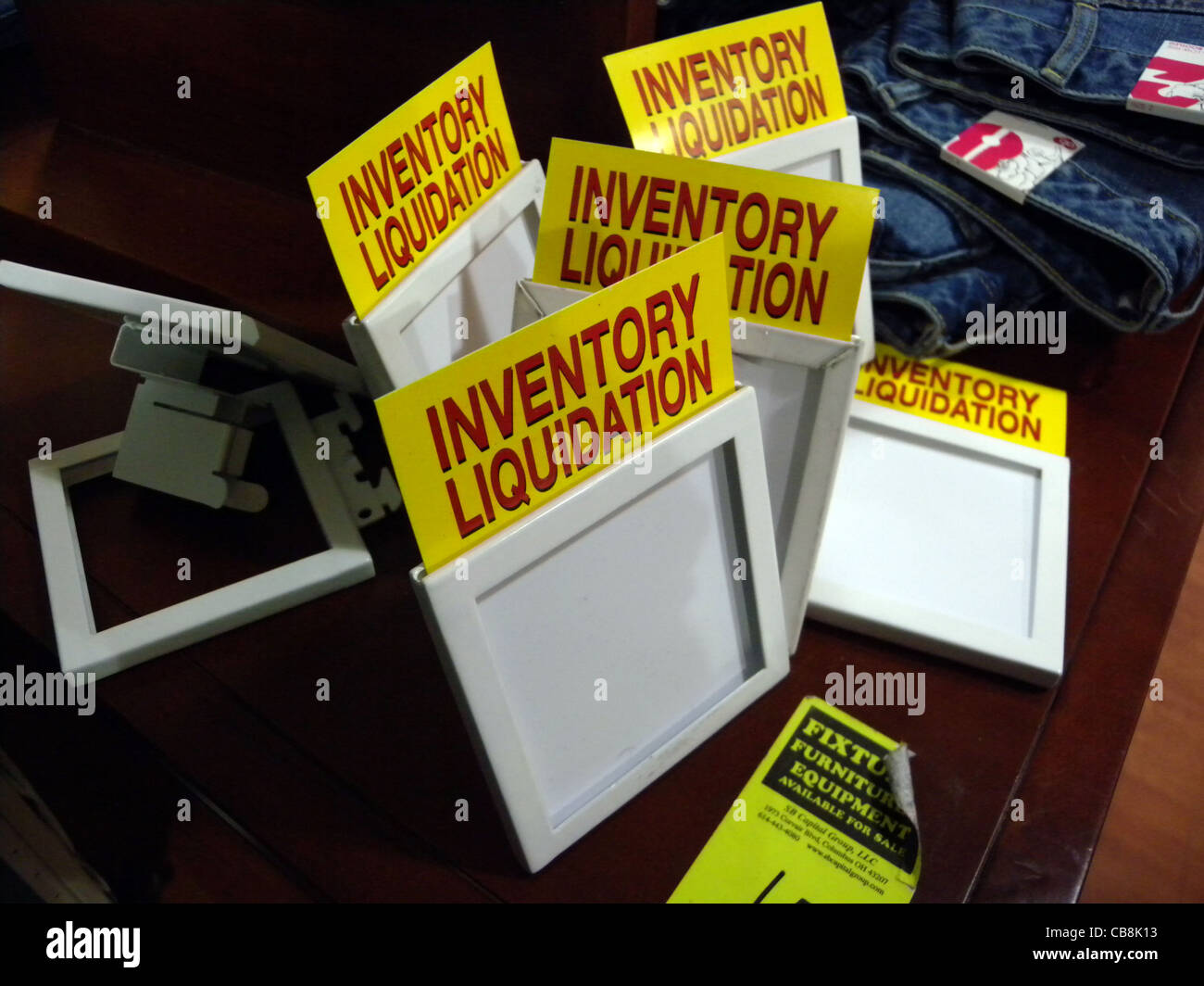 Inventory liquidation signs at a Steve & Barry's clothing store in New ...