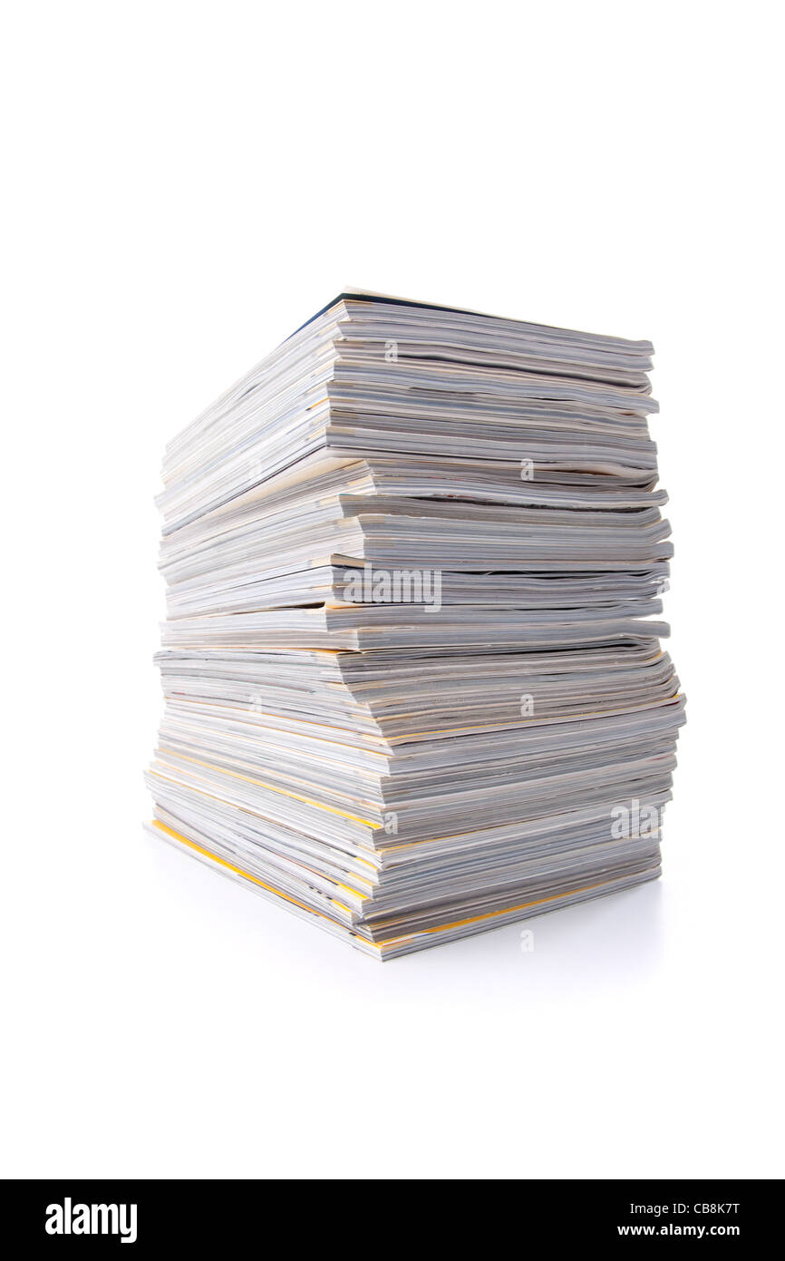 Stack of magazines isolated on white with reflection Stock Photo - Alamy