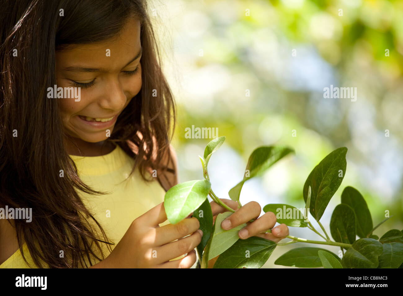 young happy female child enjoying nature Stock Photo - Alamy