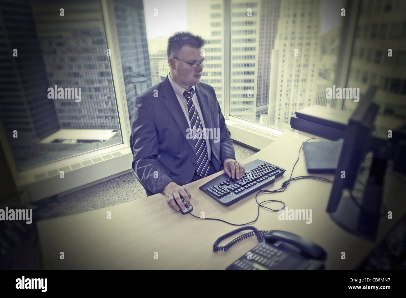 Young manager in an office Stock Photo - Alamy