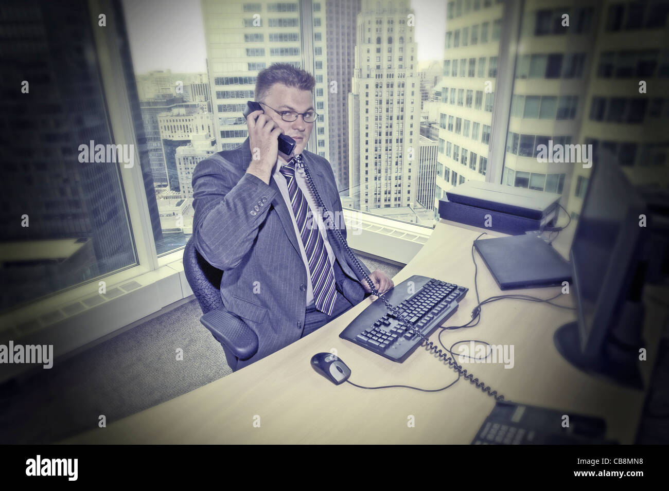 Young manager in an office Stock Photo - Alamy