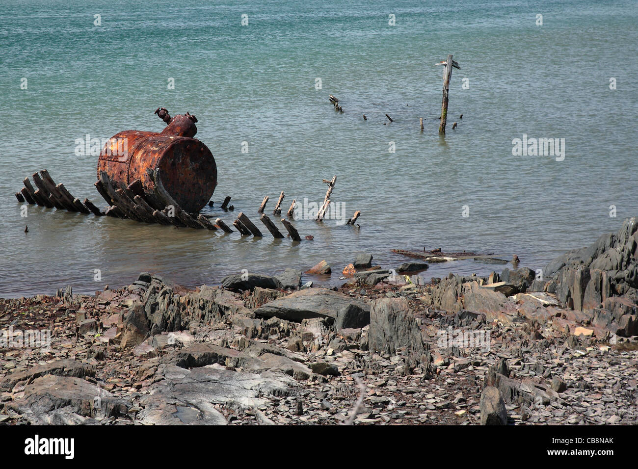 An old rotten boat with the steam boiler still remaining. Bluff, New ...