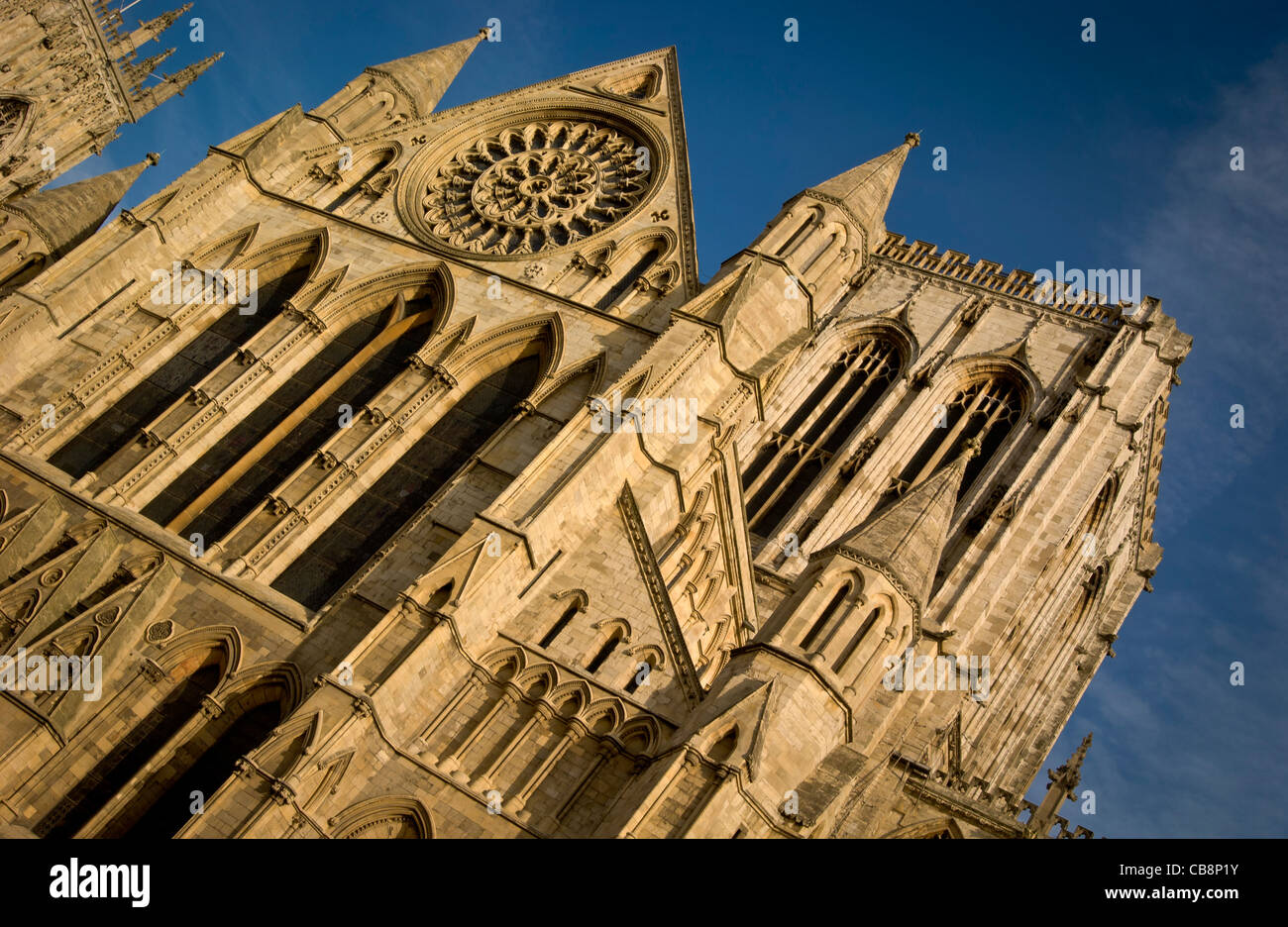 Angled shot of the Rose window and central tower of York Minster, York ...