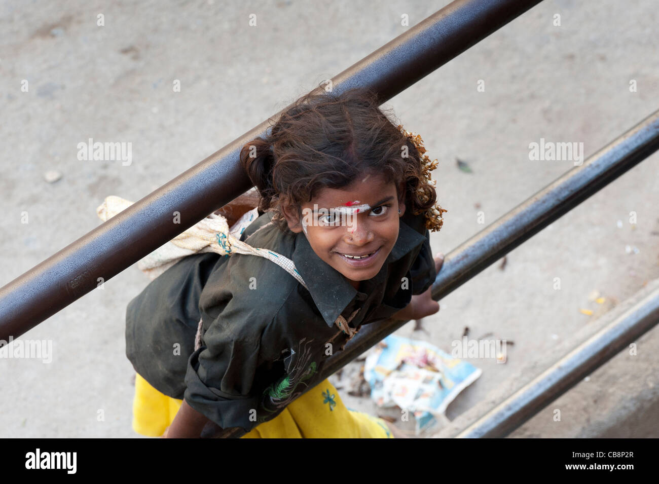 Poor Indian beggar girl looking up, selective focus Stock Photo - Alamy