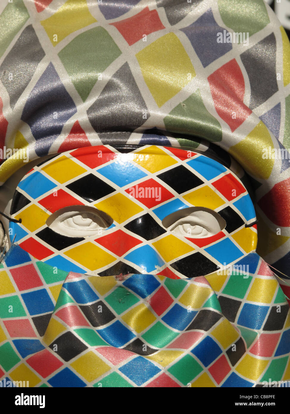 harlequin joker mannequin doll in street road Stock Photo - Alamy