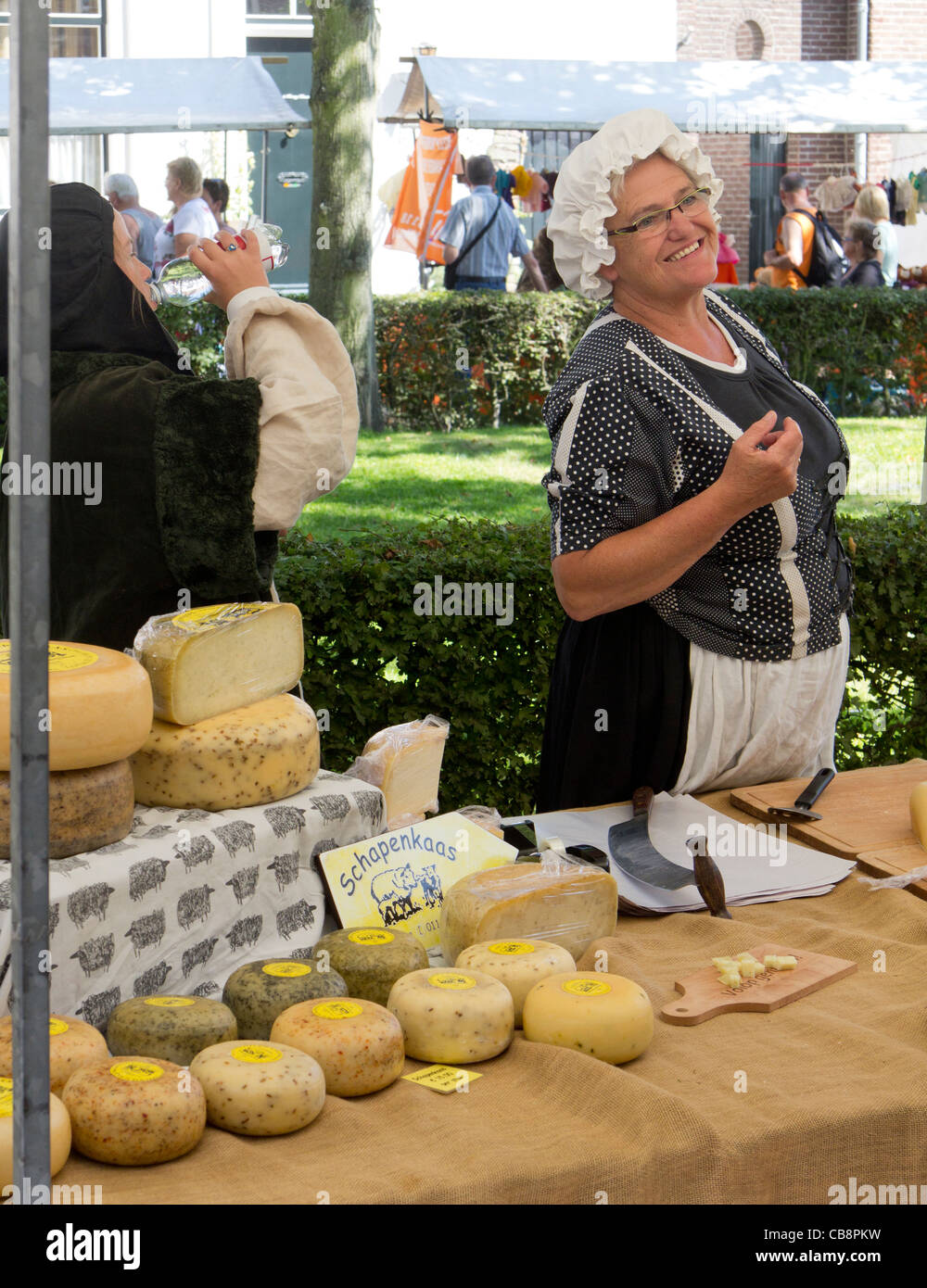 Dutch costume woman cheese hi-res stock photography and images - Alamy
