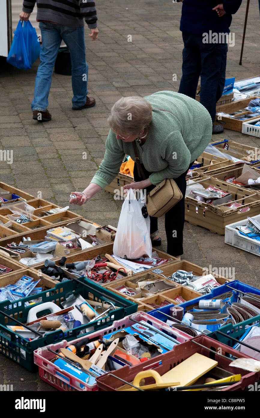Woman Looking at Plug Shopping Tools Stock Photo - Alamy