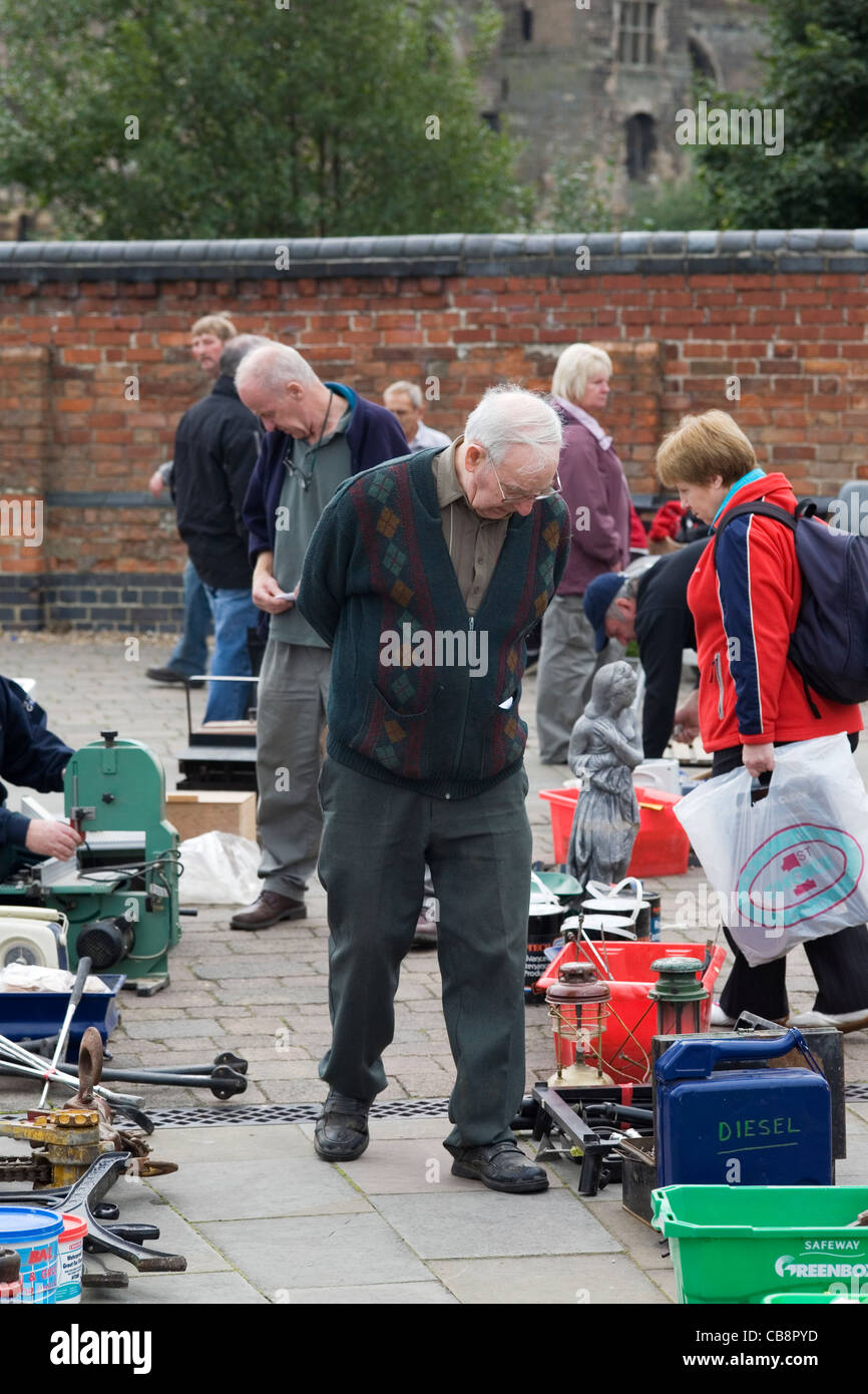 People Looking Through Junk at Car Boot Stock Photo - Alamy