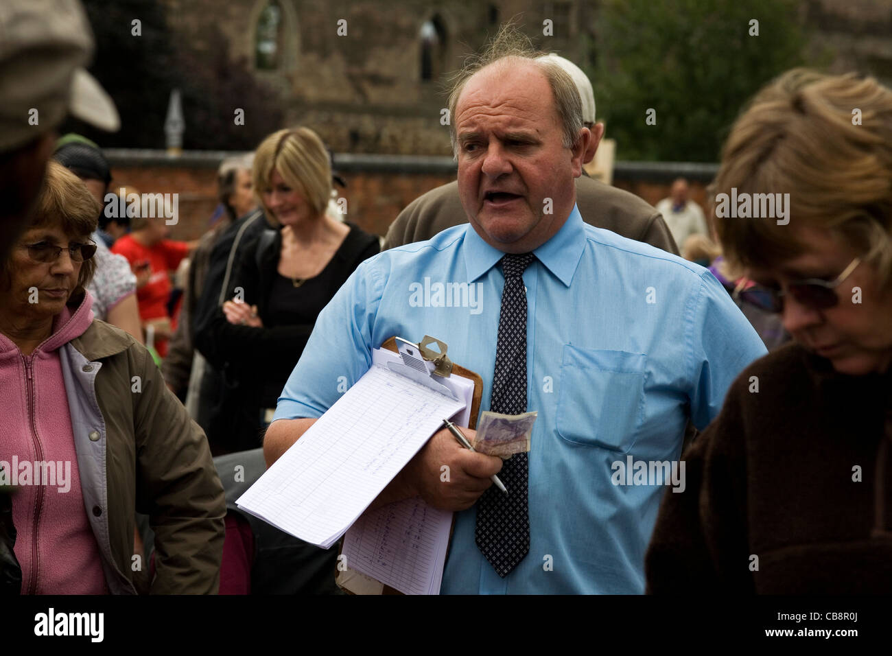 Auctioneer with Money Stock Photo - Alamy