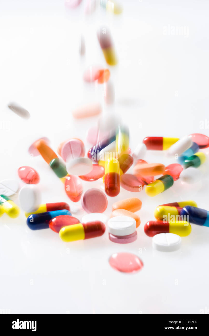 Falling tablets hi-res stock photography and images - Alamy