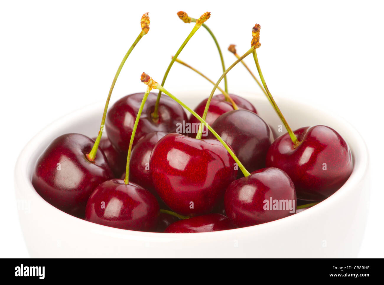 Red ripe cherries over white background Stock Photo - Alamy