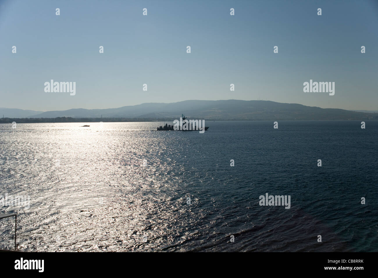 View of the Dardanelles and a Turkish naval frigate looking over to ...