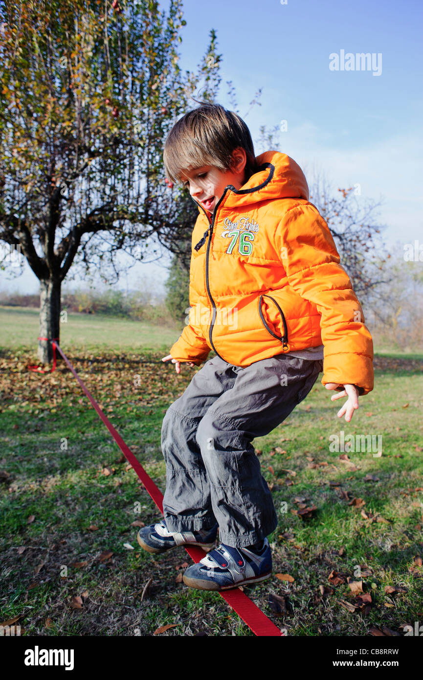 Children in slackline hi-res stock photography and images - Alamy