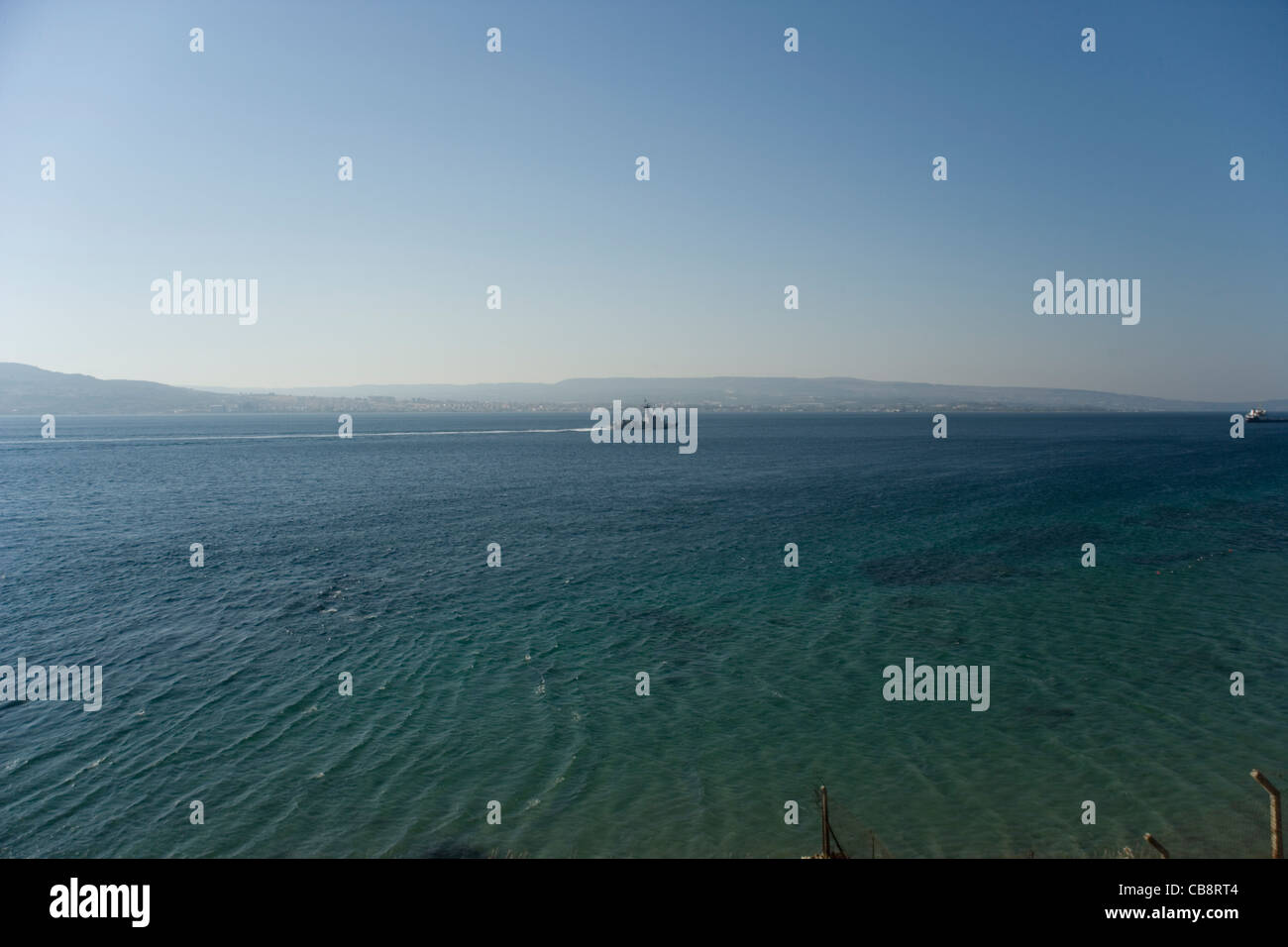 View of the Dardanelles and a Turkish naval frigate looking over to ...