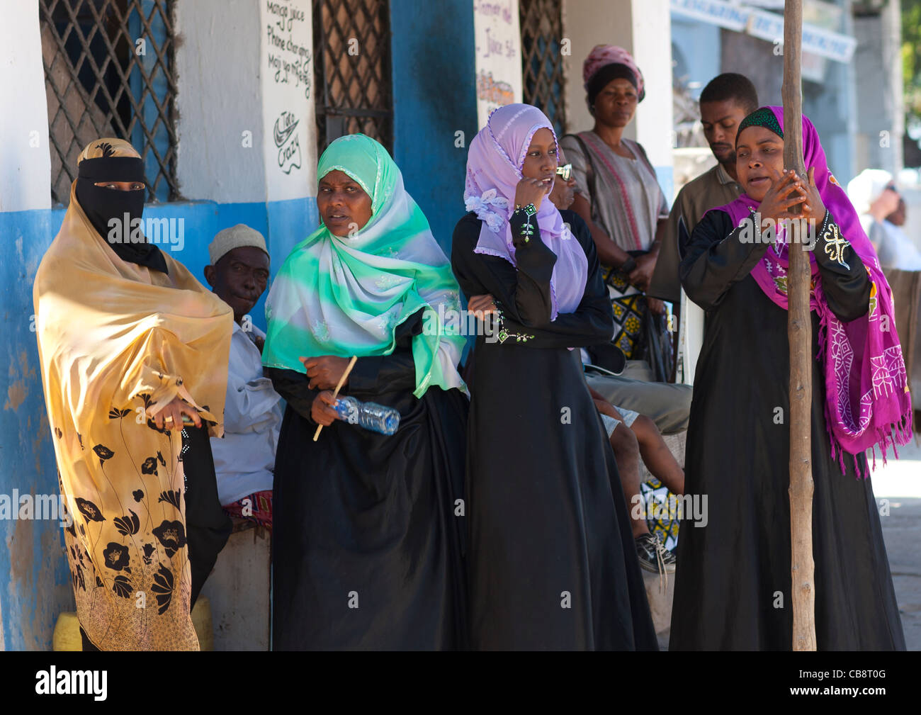 Small Group Of Muslim Women Outside A House In The Shadow, Lamu, Kenya ...