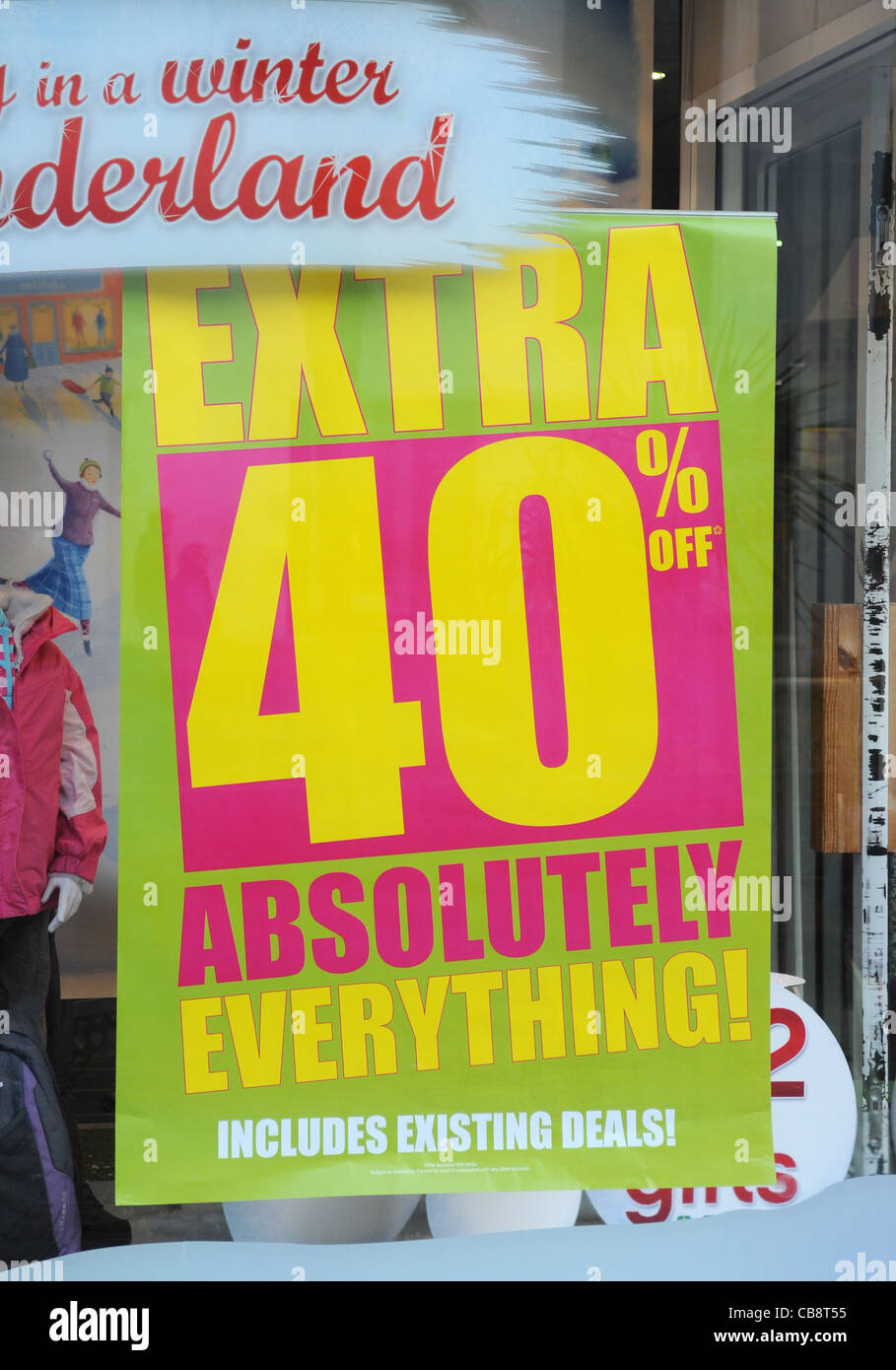 Discount sign in shop window Stock Photo - Alamy