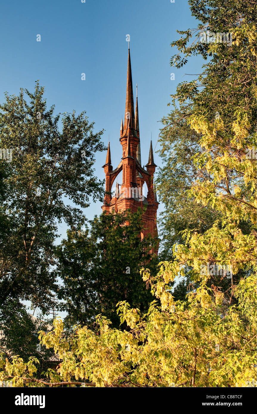 fairy tale, castle like catholic church with trees in foreground and ...