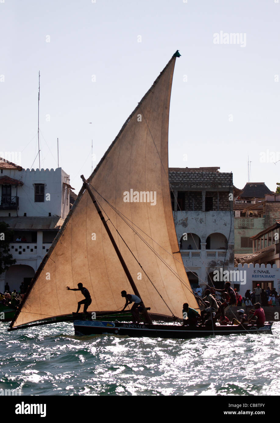 Men Steering Their Dhow Near Lamu Dockside, Lamu, Kenya Stock Photo - Alamy