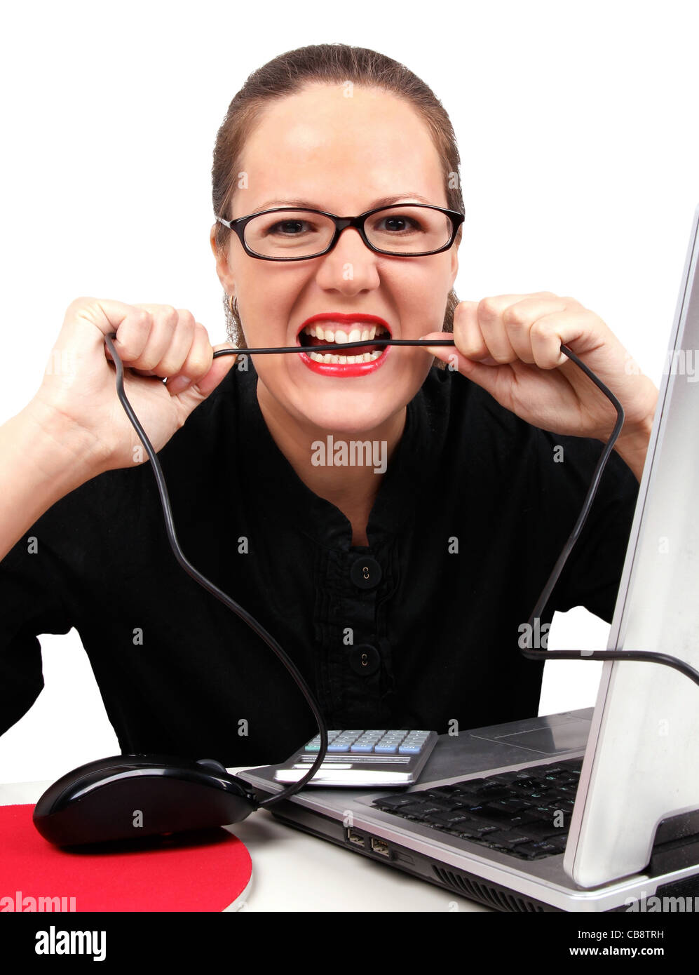Angry businesswoman biting a cable, portrait on white Stock Photo - Alamy