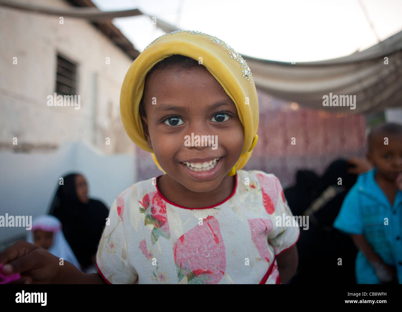 Mischievous Girl Smiling At Camera, Lamu, Kenya Stock Photo - Alamy