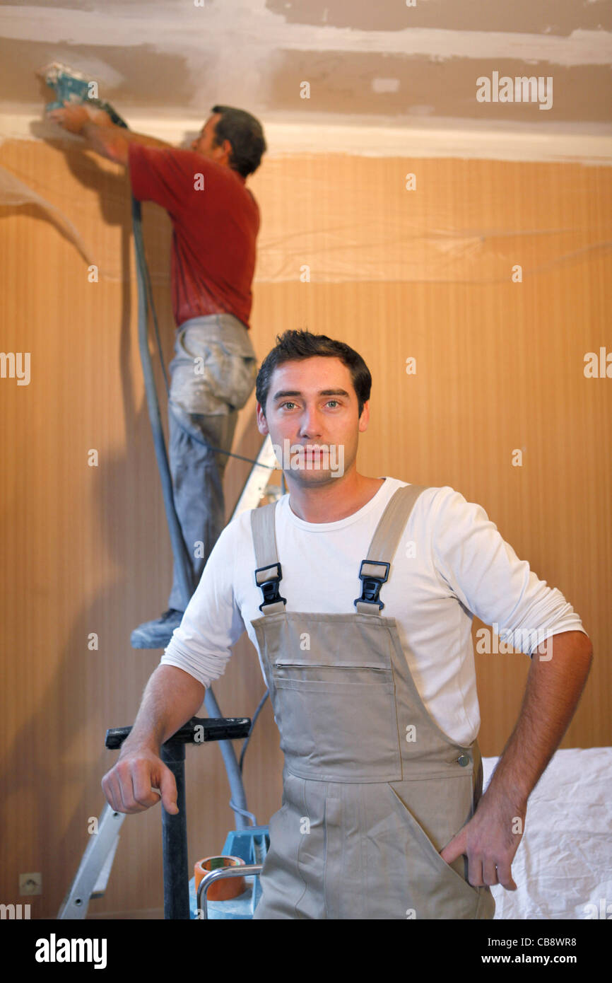 Electrician working indoors cutting hi-res stock photography and images ...