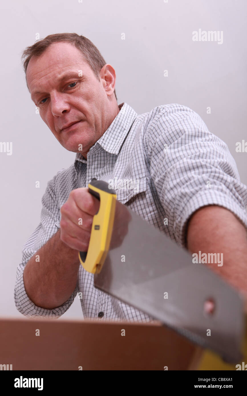 Man sawing top view hi-res stock photography and images - Alamy