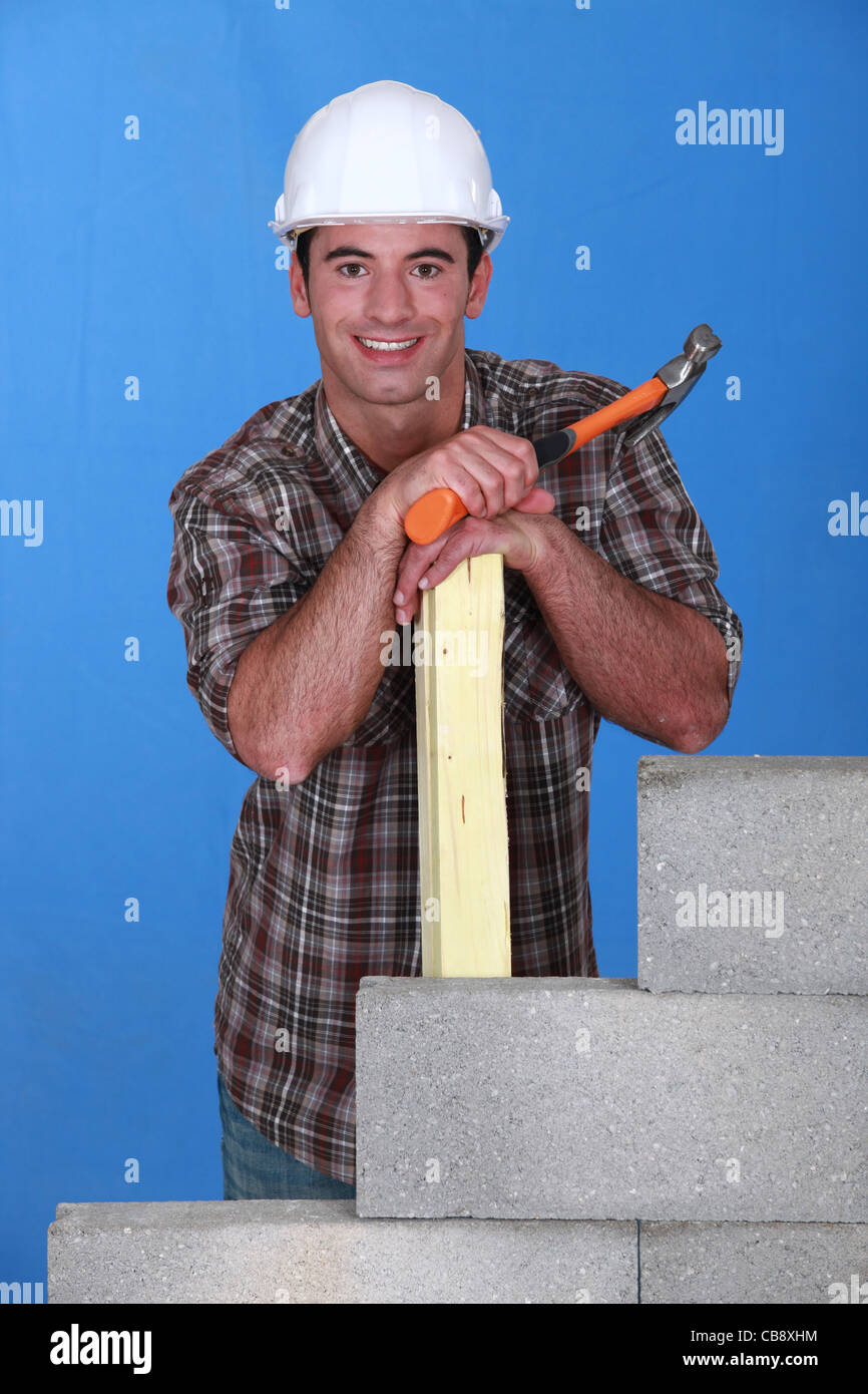 Portrait of a smiling tradesman Stock Photo - Alamy