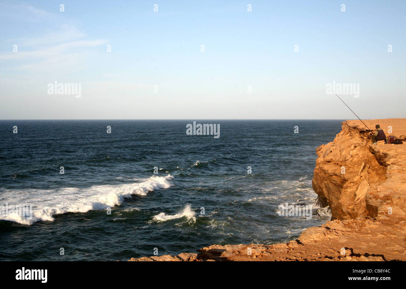Fishing on the high Atlantic cliffs of the Western Sahara, Morocco ...