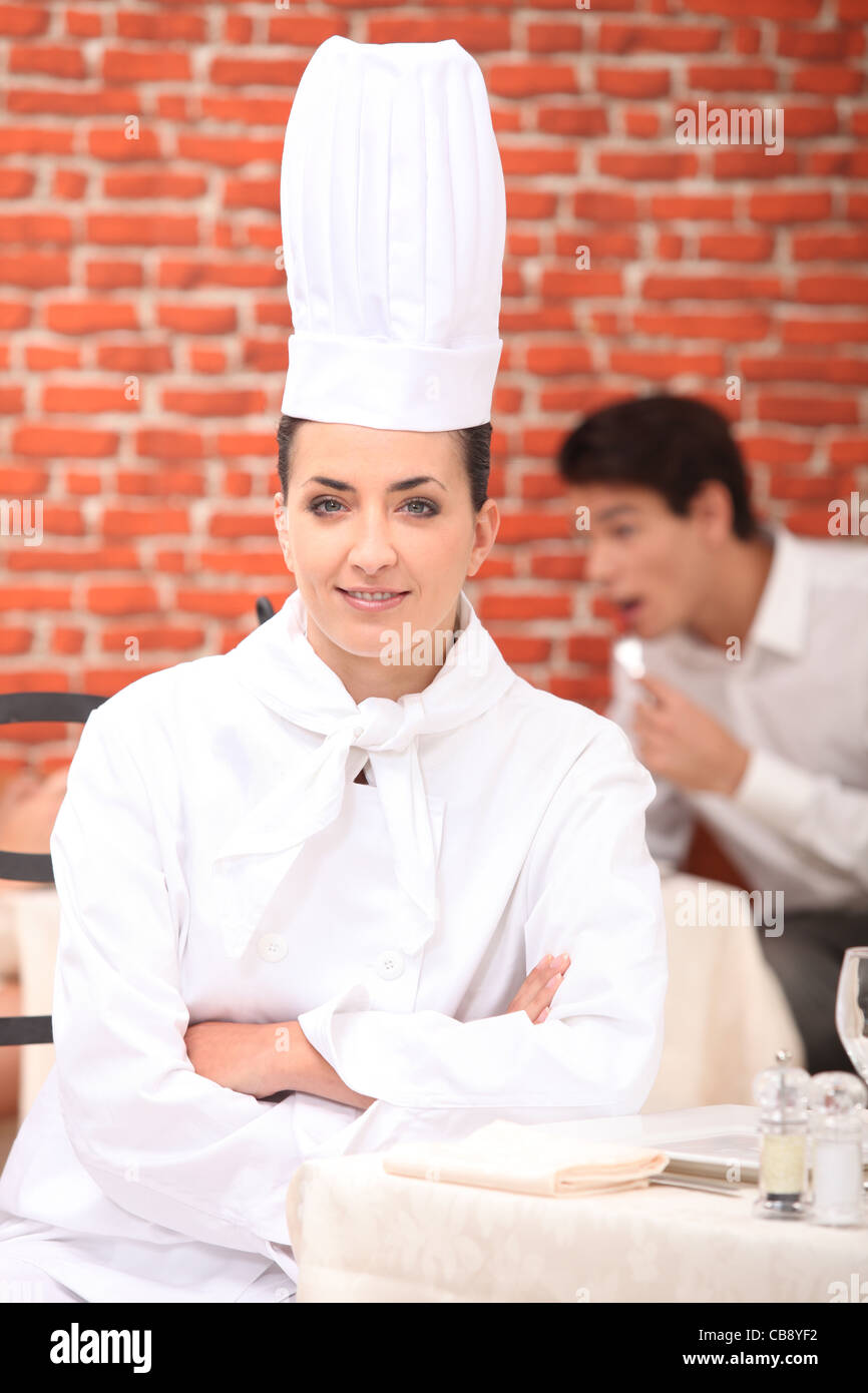 Chef seated in a restaurant Stock Photo - Alamy