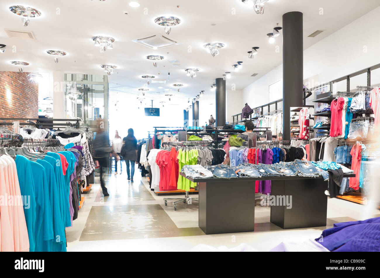 interior of the modern clothes shop. Image overexposed by intent, all ...