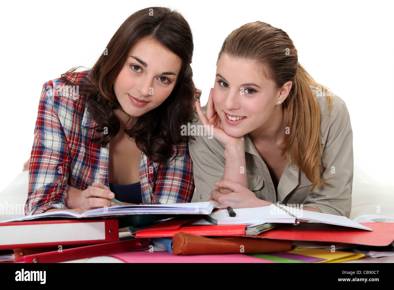 Two girls revising together Stock Photo - Alamy