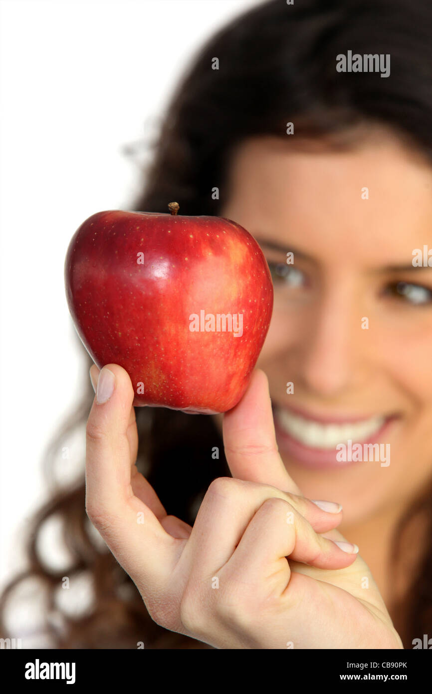 young woman holding an apple Stock Photo - Alamy