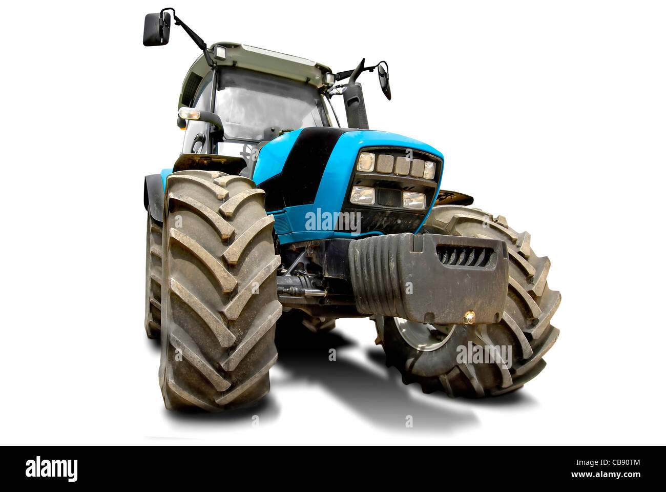 Blue tractor in a white background Stock Photo - Alamy