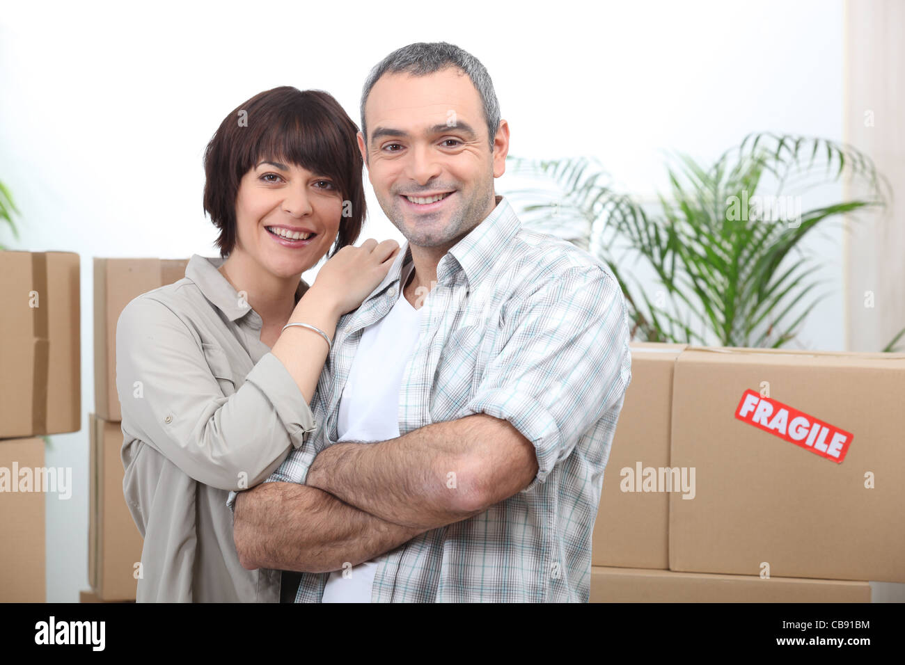 Couple moving in Stock Photo - Alamy