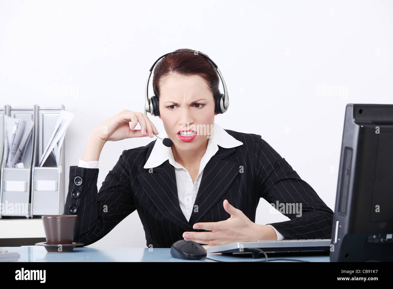 Front view of an beautiful business woman shouting through the ...