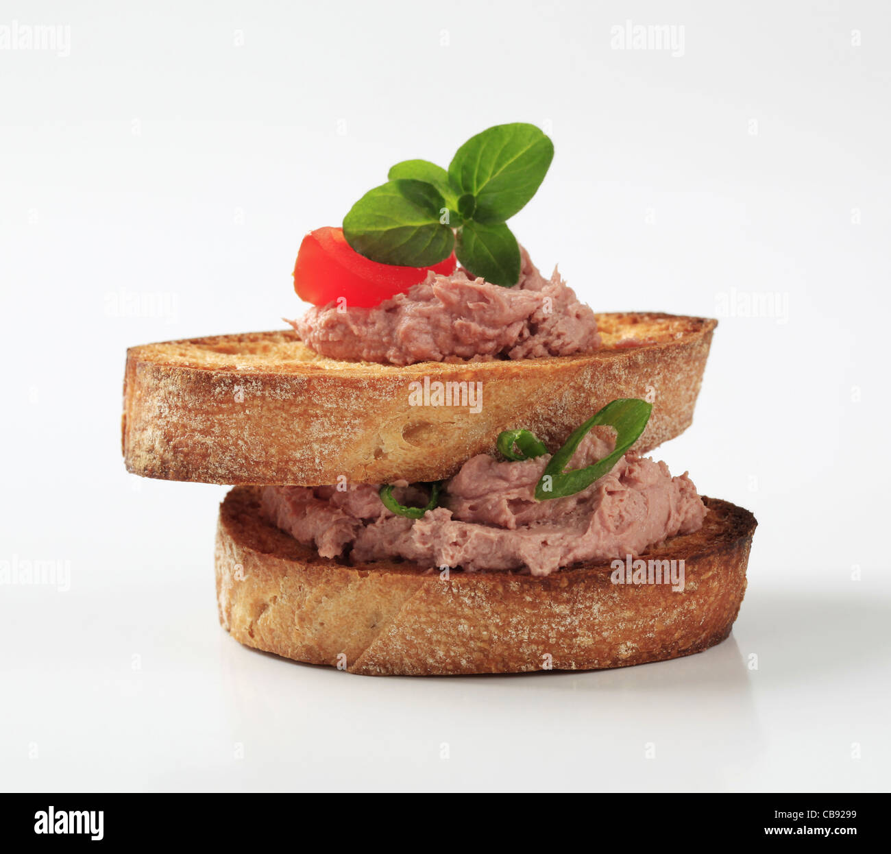 Two slices of toasted bread and pate Stock Photo - Alamy