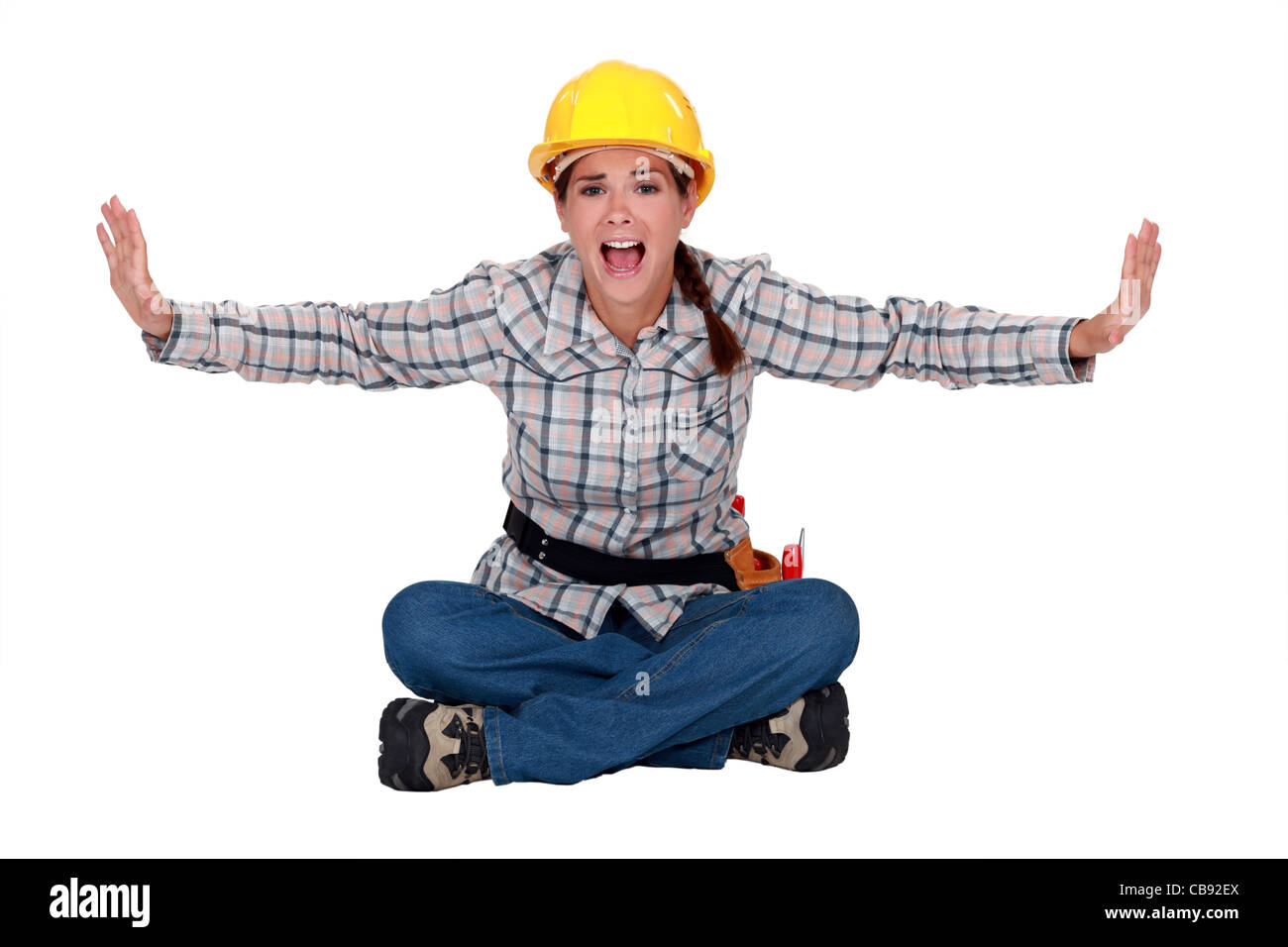 Woman carpenter screaming Stock Photo - Alamy