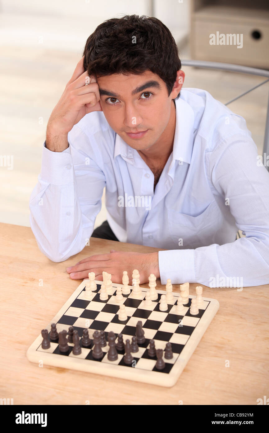 boy playing chess Stock Photo - Alamy