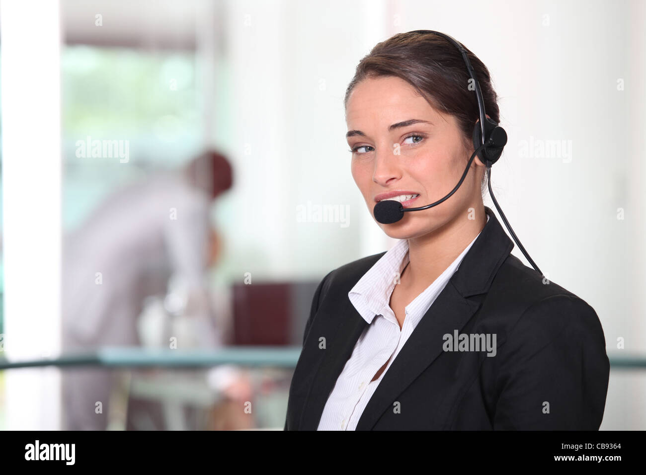 Woman wearing headset Stock Photo - Alamy