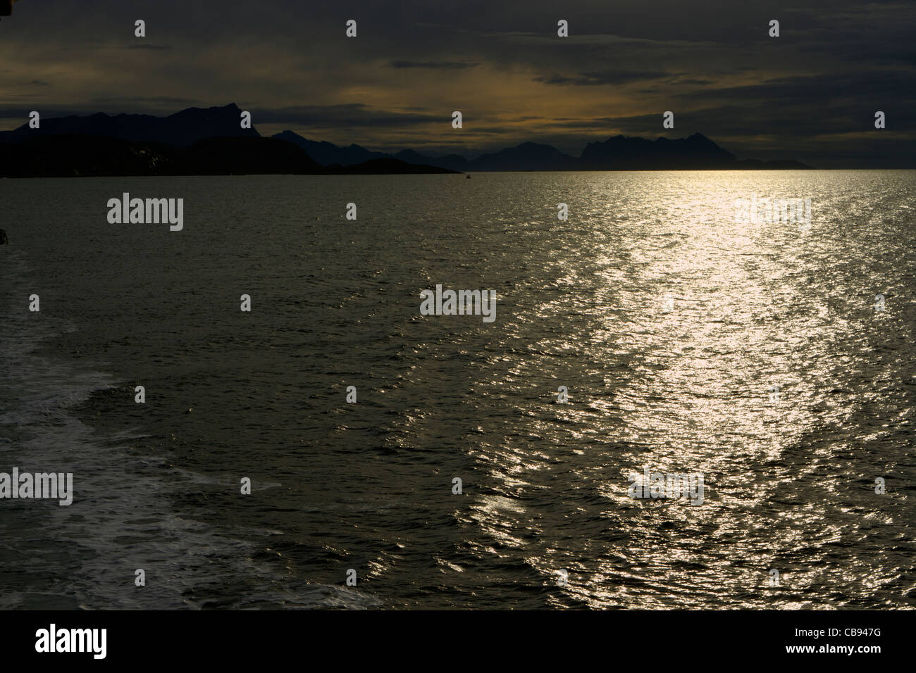 Leaving Bodo harbour at sunset Stock Photo - Alamy